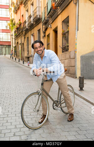 Handsome stylish Spanish man posing outdoors Stock Photo - Alamy