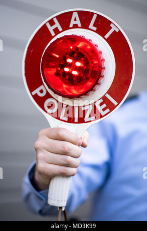 Police officer with "Halt, Polizei" sign Stock Photo - Alamy