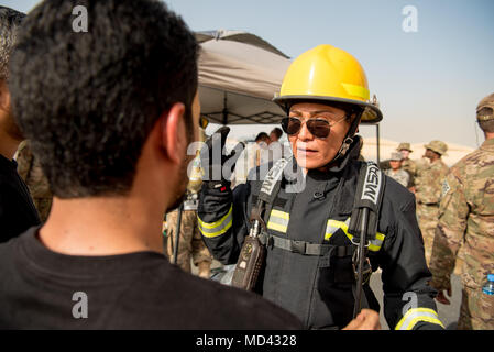 A firefighter with the Qatar Emiri Air Force Fire Department, Al Udeid ...