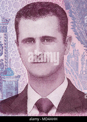 Bashar al-Assad President of Syria poster and flag at an anti Assad ...