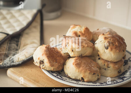 fresh home baked sweet bread donut cake with almonds and icing sugar on ...