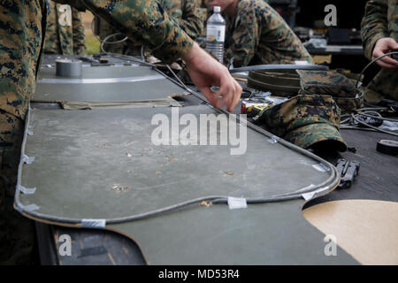 U.S. Marines from different units detonate a window charge during an ...