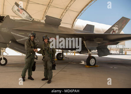 U.S. Marines Lt. Col. Christopher J. Kelly, middle, outgoing commanding ...