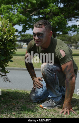 CAMP LESTER, OKINAWA, Japan – The zombie volunteers race after the ...