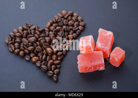 Rahat locum with coffee beans in heart shape Stock Photo - Alamy