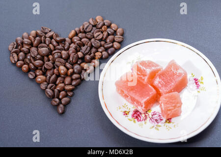 Rahat locum with coffee beans in heart shape Stock Photo - Alamy