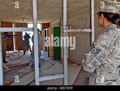 An airmen from the 143d Security Forces Squadron (SFS), Rhode Island ...