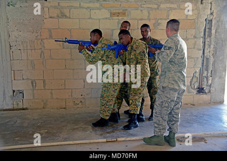 An airmen from the 143d Security Forces Squadron (SFS), Rhode Island ...