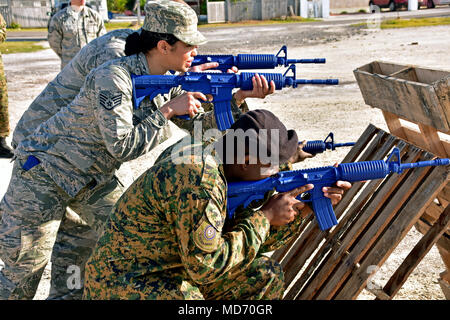 An airmen from the 143d Security Forces Squadron (SFS), Rhode Island ...