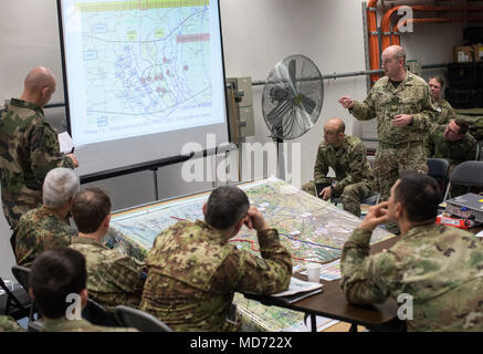 A multinational team deconflicts targeting priorities during a daily ...
