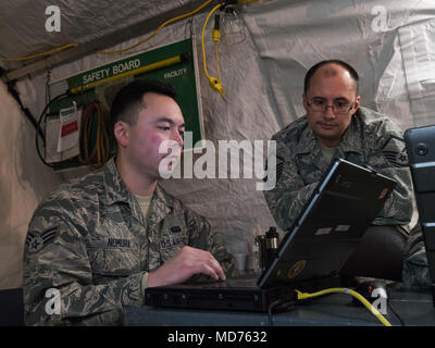 An Airman from the 283rd Combat Communications Squadron (CCS) from ...