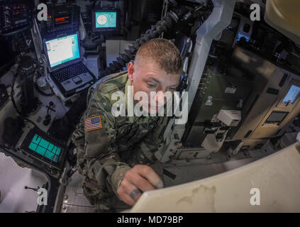Army Reserve Sgt. Artem Patouga, a chemical, biological, radiological ...