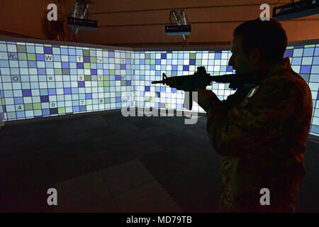 An Italian Army Soldier, participates in a simulated shooting drill at ...