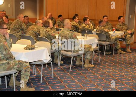 Installation community members listen to Col. Michelle Link, commander ...