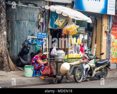 Vietnamese food cart at side of the road selling Stock Photo - Alamy