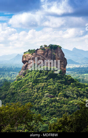 sigiriya rock formation in rural sri lanka with tropical forest and ...