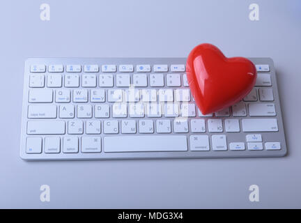 Small red heart on keyboard internet dating concept, Valentine Day ...