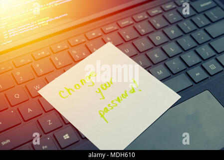Change your password message concept written post it on laptop keyboard ...