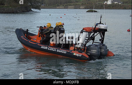 Orange rescue boat with outboard engine built from glass reinforced ...