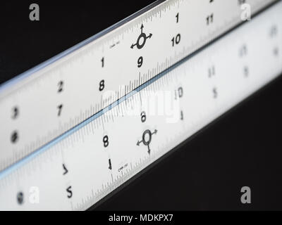 silver ruler tool on mirror Stock Photo - Alamy