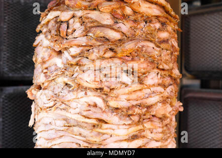 Large Gyros skewer spinning in a local restaurant Stock Photo - Alamy