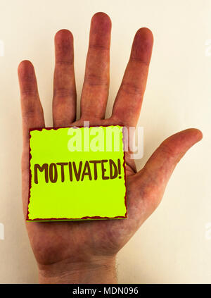 Handwriting text Motivated Motivational Call. Concept meaning Willing ...