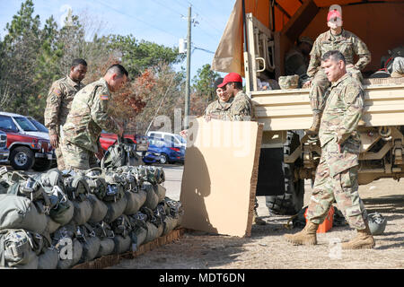 U.S. Army riggers assigned to the 824th Quartermaster Company prepare ...