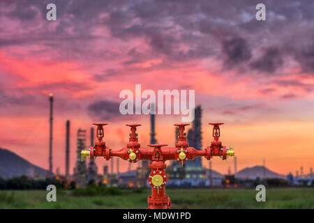 Fire hydrants and oil refinery plant blur background Stock Photo - Alamy