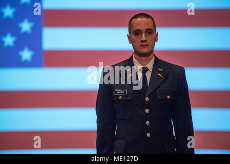 U.S. Army 2nd Lt. Benjamin McCall’s mother and sister pin on his rank ...