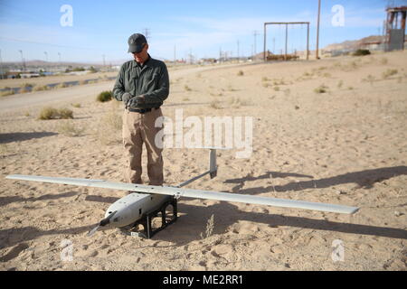 Daniel Lloyd, Lockheed Martin Skunk Works, prepares the unmanned air ...