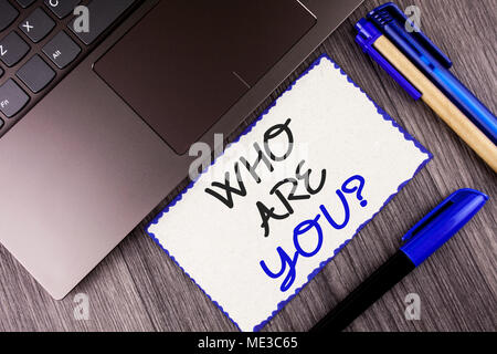 Sticky note with the text Introduce yourself on office desk. Self ...