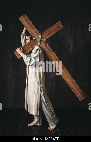 The great martyr with cross, black background. Crucifixion of Jesus ...