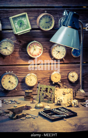 Old workshop with parts of clocks and tools Stock Photo - Alamy
