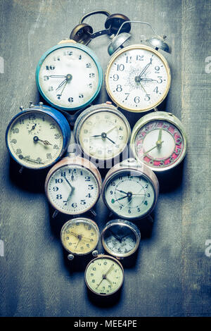 Mix of old clocks in pile. Parts of the old clock Stock Photo - Alamy