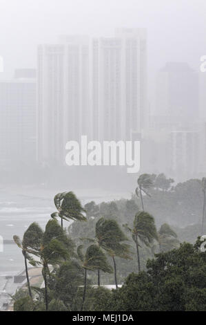 A tropical storm lashes Waikiki with high winds and rain, Honolulu ...