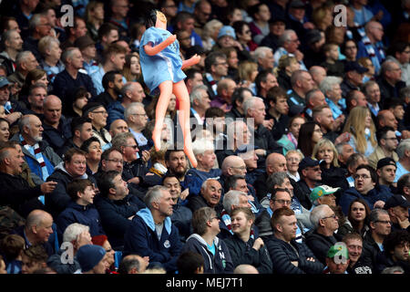 Manchester City fans hold up scarfs ahead of the Premier League match ...