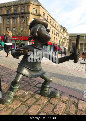 The statue of Beano character Minnie the Minx sports a protective face ...