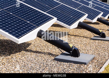 Blue rotating solar panels tilted axis tracker, future energy concept ...