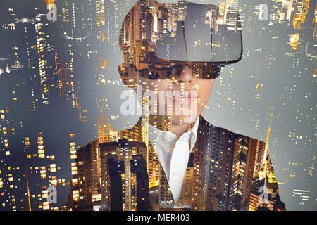 Young Japanese man using VR goggles Stock Photo - Alamy
