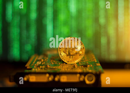 Bitcoin mining graphic card on a blurry matrix background Stock Photo ...