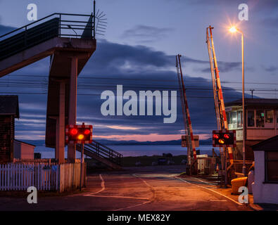 Hest Bank Level crossing with barriers and flashing lights on the west ...
