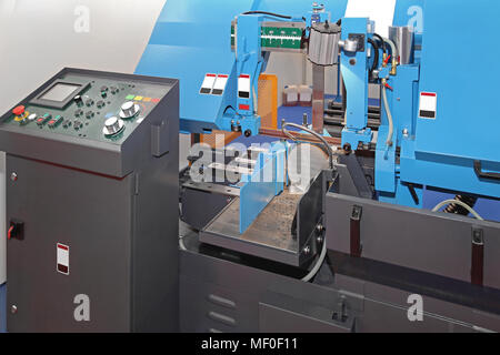 Automatic metal cutting band saw powerful machine Stock Photo - Alamy