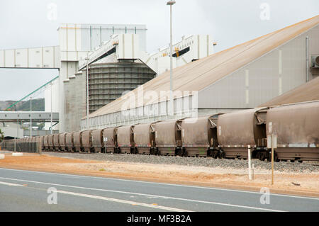 Long grain freight train at silo storage elevator site in Moree town of ...