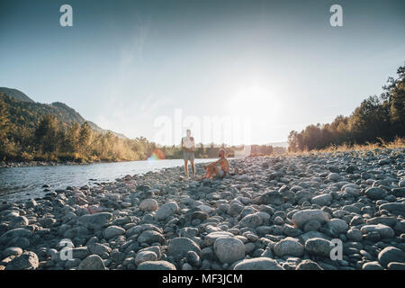 Canada, British Columbia, two men cooking at Blue Lake Stock Photo - Alamy