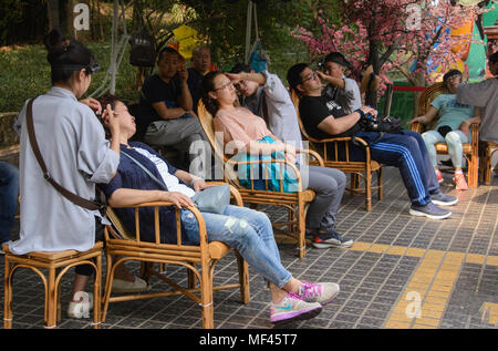 Ear cleaning on Jinli Ancient Street, Chengdu, Sichuan, China Stock ...