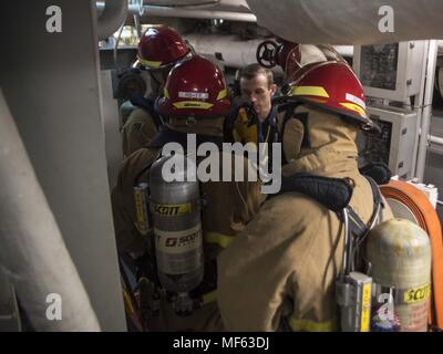 US Navy Damage Controlman 2nd Class uses a Portable Exothermic Cutting ...