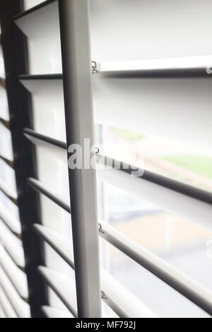 Close up of plantation shutters open Stock Photo - Alamy