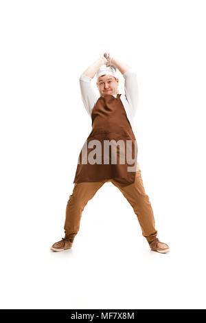 Angry aggressive butcher posing with a cleaver isolated on white ...