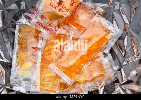 Yi Pin condiment packets of duck sauce, soy sauce, and mustard sauce in ...
