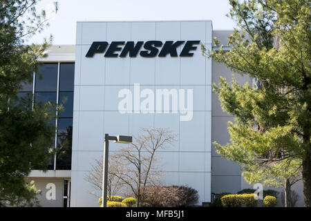 A logo sign outside of the headquarters of Penske Truck Leasing in ...